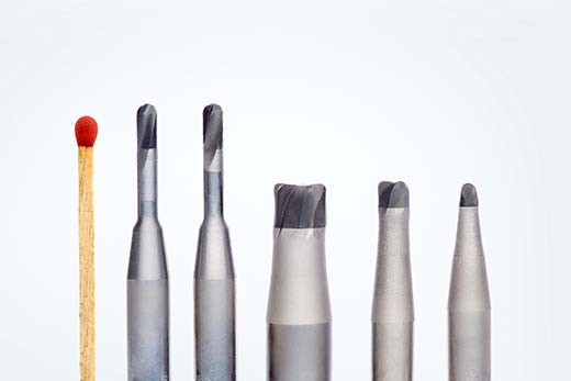 Machining carbide with PCD solid head milling cutters